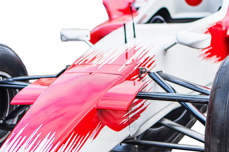 Side View of a Red and White Formula One Car with Aerodynamic Features ...