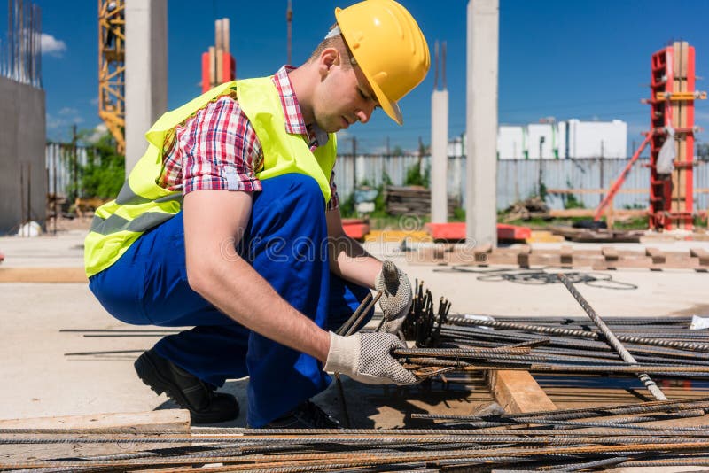 Reliable Worker Checking the Quality of the Steel Bars Stock Photo ...
