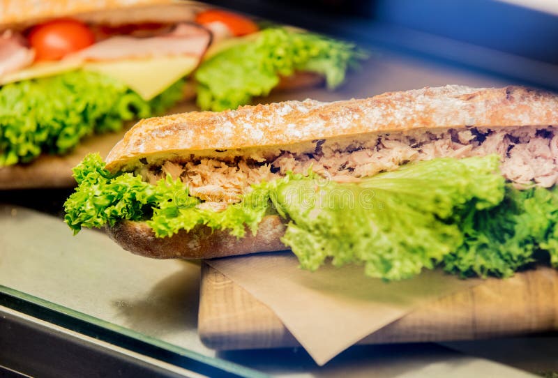 Side View at Sandwich Snack with Salat Under Glass Stock Image - Image ...