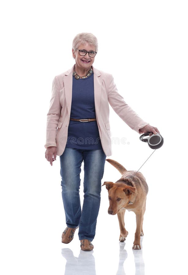 Side View . Senior Lady and Her Dog Walking Together Stock Photo ...