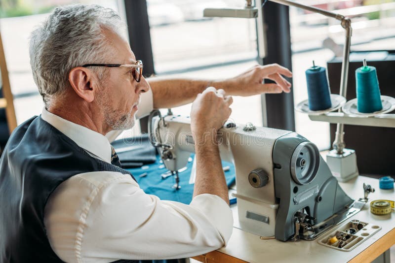 Man Threading Needle Stock Photos - Download 70 Royalty Free Photos