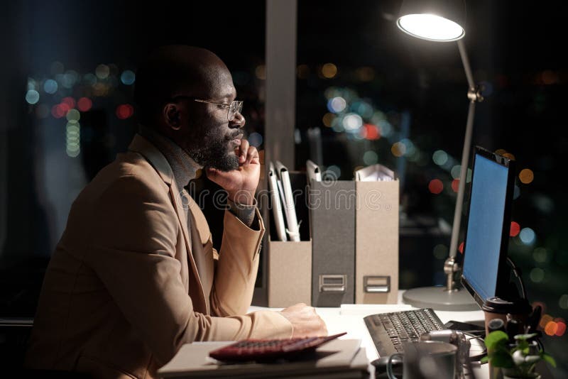 Side View of Serious Businessman Looking at Computer Screen Stock Image ...