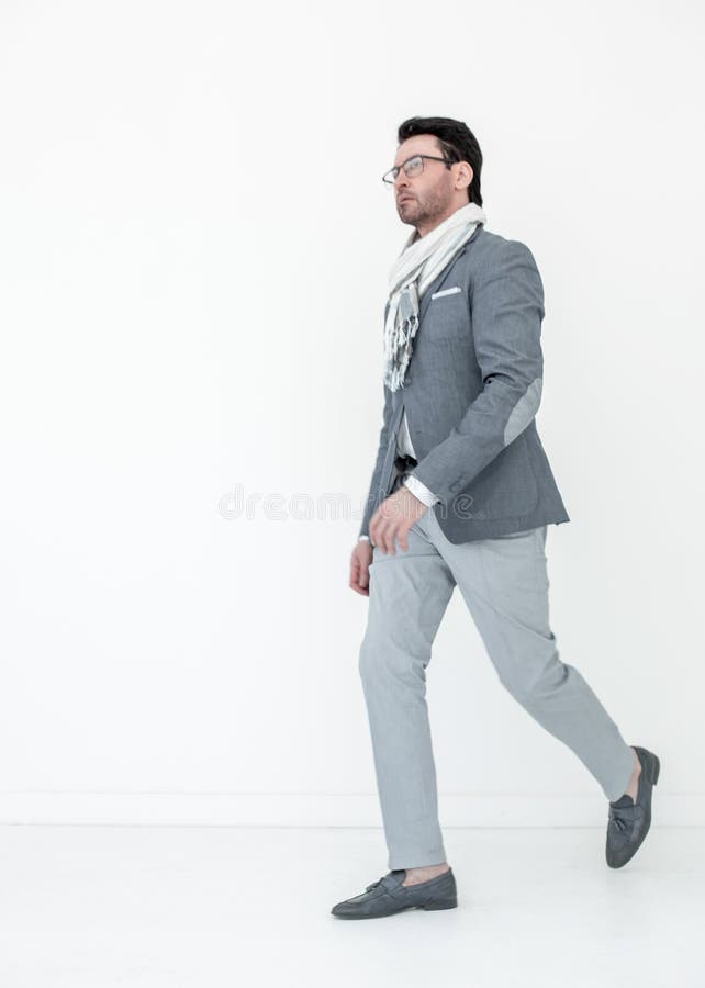Side View .a Serious Man Confidently Striding Forward Stock Image ...