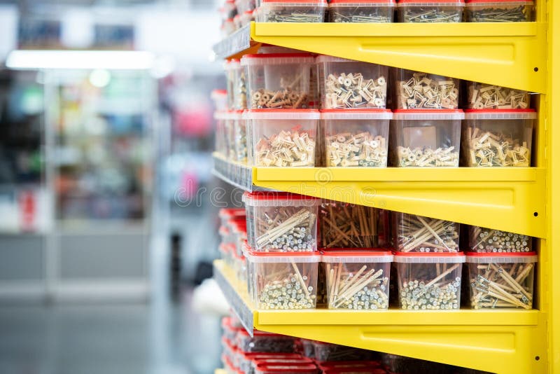 Side View of Shelves with Stacks of Plastic Containers Stock Image ...