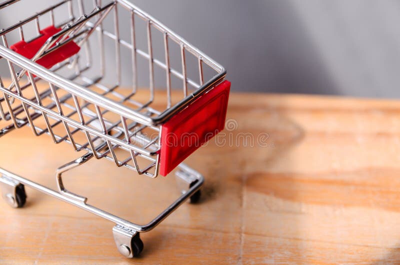 Side View of Shopping Cart on Wood Table ,shopping Concept Stock Photo ...