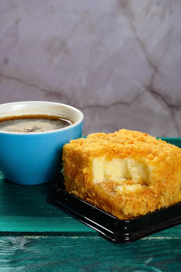 Shredded Pork Cake with a Bite and Cup of Coffee Nearby Stock Image ...