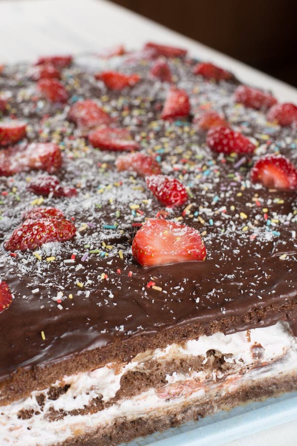 Side View of Sliced Chocolate Cake with Fresh Strawberries. Stock Image ...