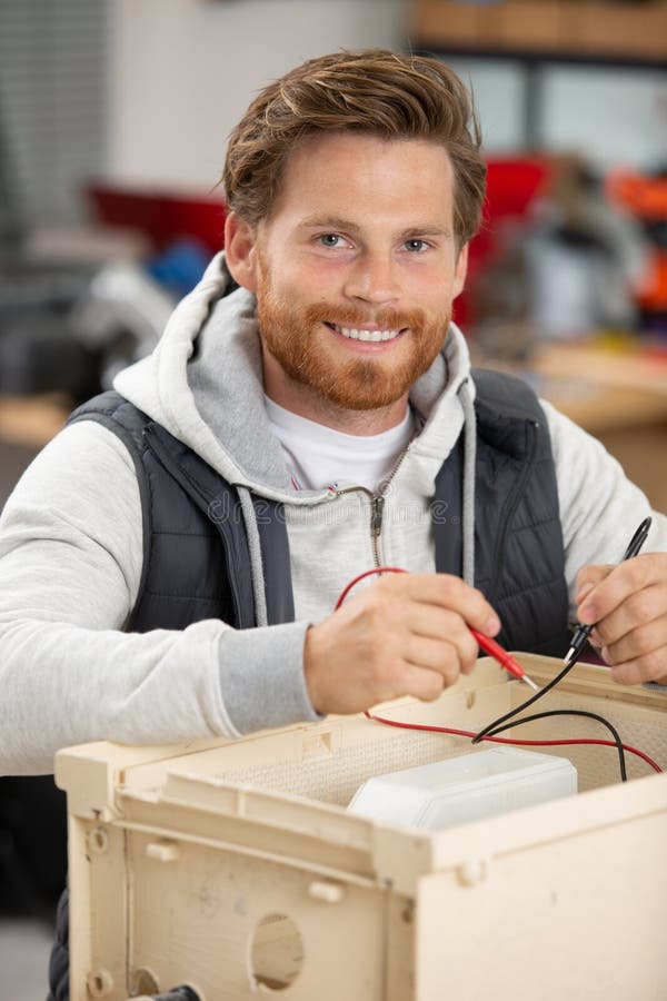 Side View Smiling Handsome Electrician Repairing Electrical Box Stock ...