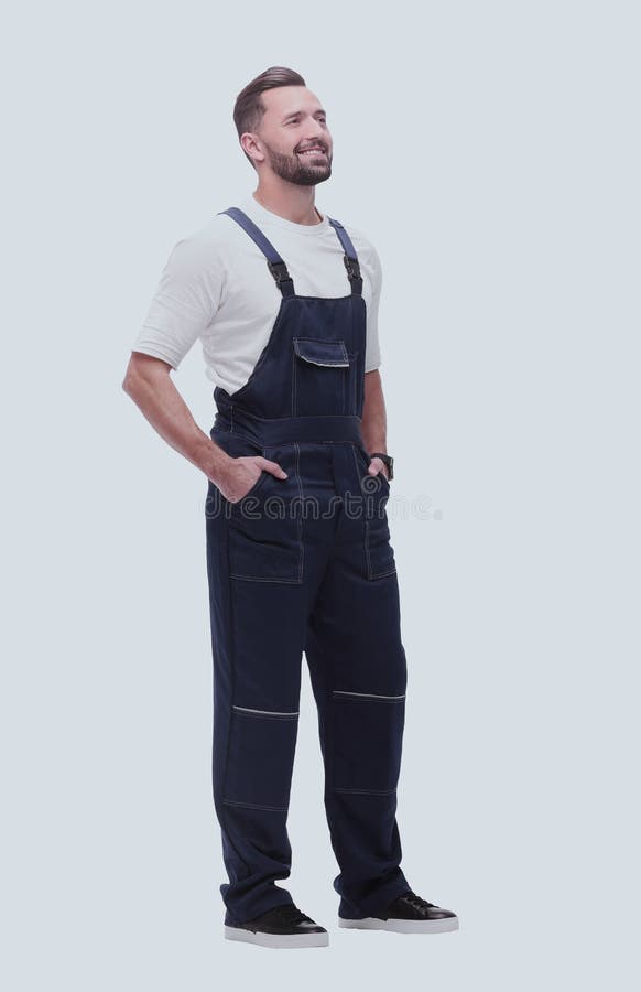 Side View. Smiling Man in Overalls Looking Forward To Copy Space Stock ...