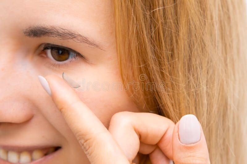 Side View of a Smiling Woman Applying Contact Eye Lenses Stock Image ...