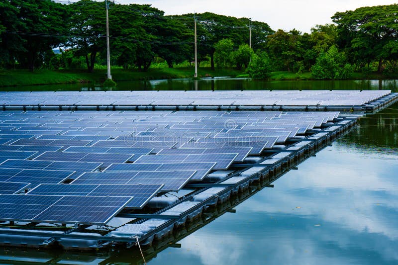 Side View of Solar Panels Floating on Water in a Lake, for Generating ...