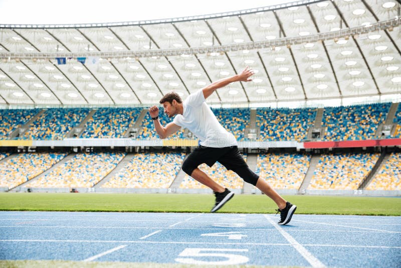 Side View of a Sport Man Running on a Racetrack Stock Image - Image of ...