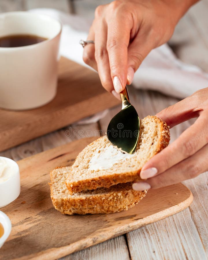 Side View on Spreading Bread Slice with Butter Stock Image - Image of ...