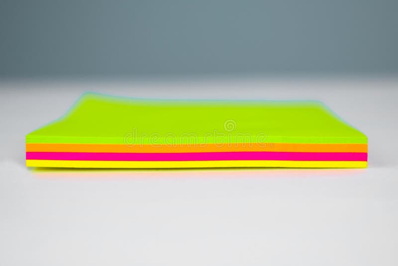 Side View of a Stack of Different Colored Paper Sticky Notes on Top of ...