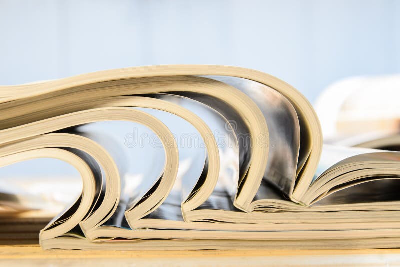 Side View of a Stack of Magazines Stock Image - Image of colorful ...