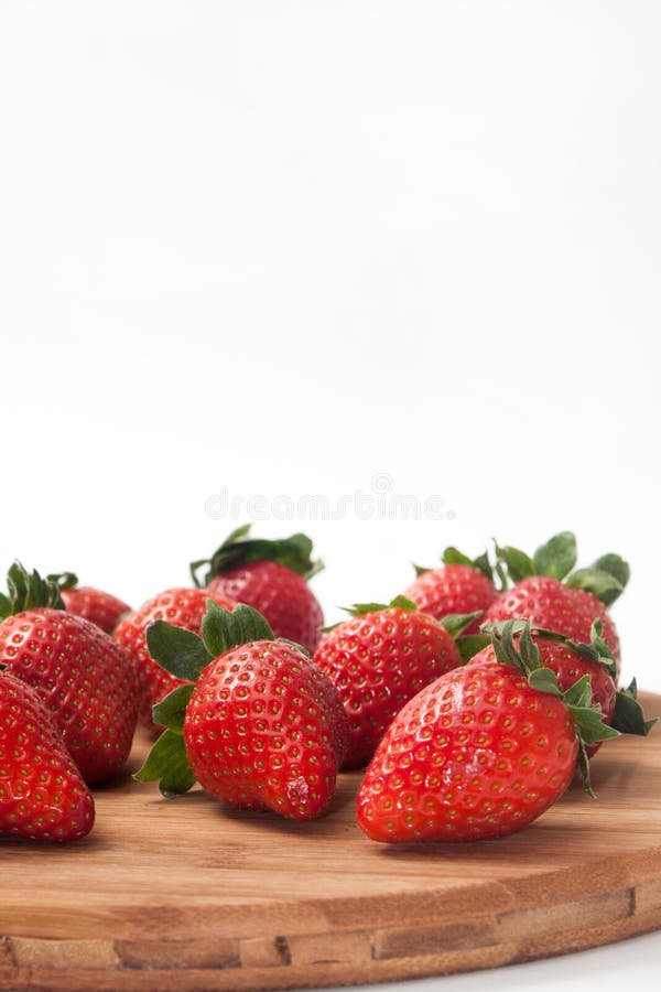 Side View of Strawberries on the Kitchen Wooden Board Stock Photo ...