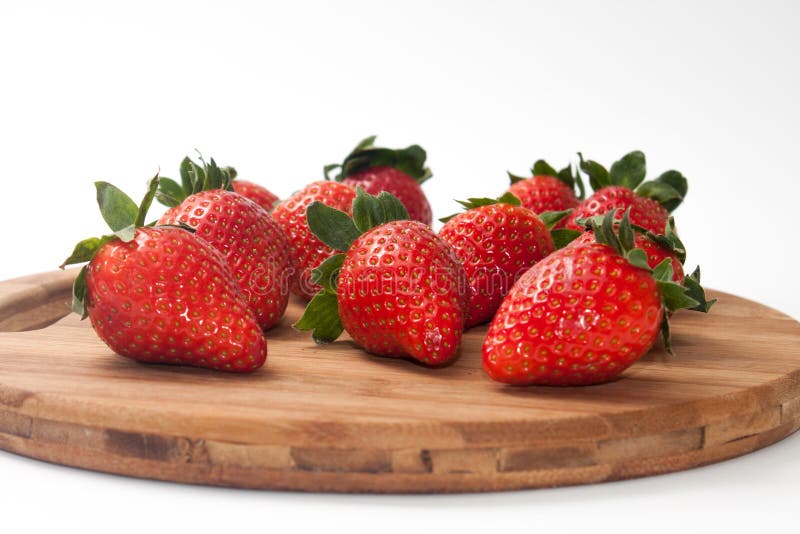 Side View of Strawberries on the Kitchen Wooden Board Stock Photo ...