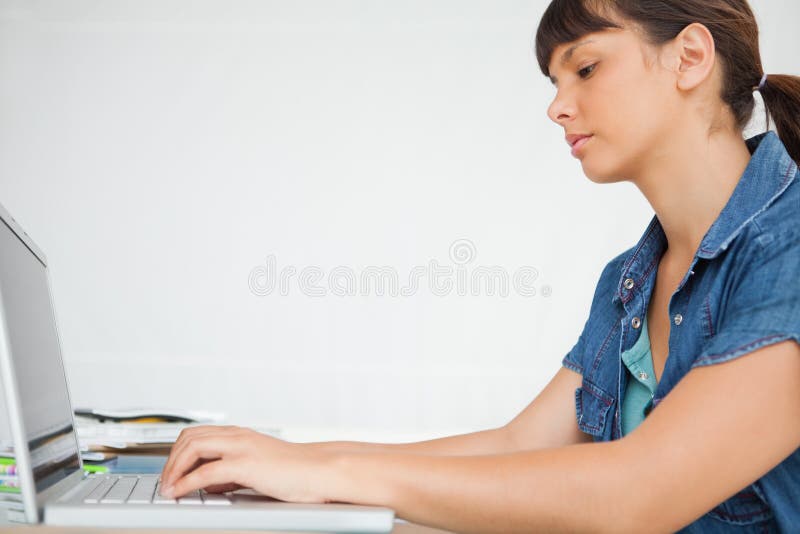 Side View of a Student Doing Her Homework Stock Photo - Image of typing ...