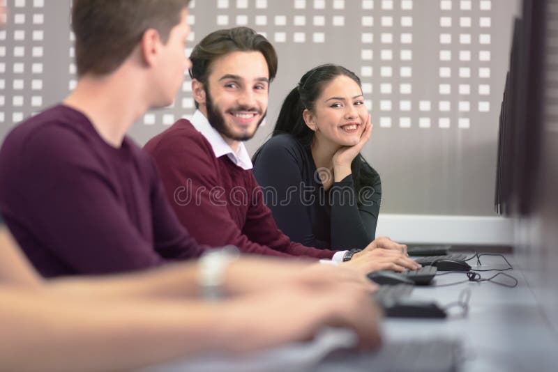Side View of Students Using Computer in Lab. it Student Looking and ...