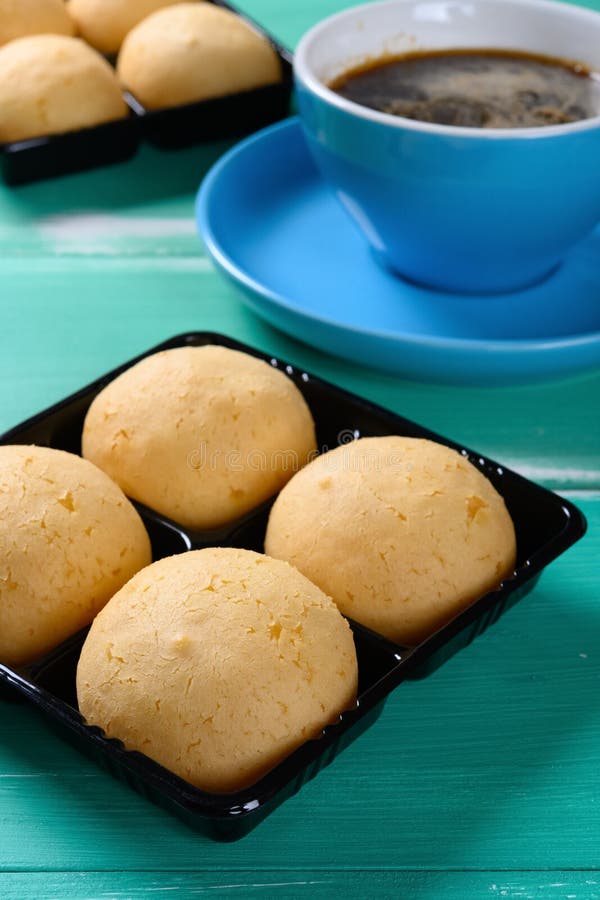 Side View Sweet Puffs and Cup of Coffee Vertical Composition Stock ...