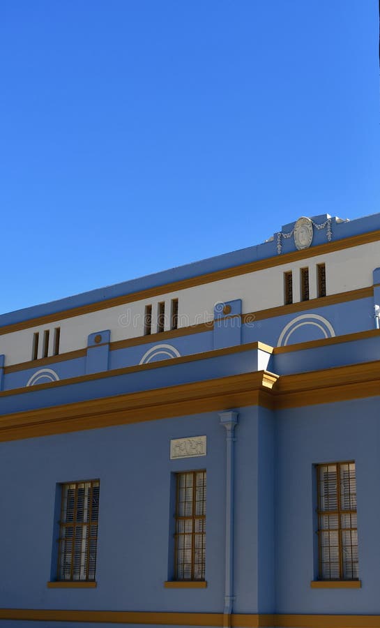 Side View of Tall Building with Rectangular Windows Reflecting Bright ...