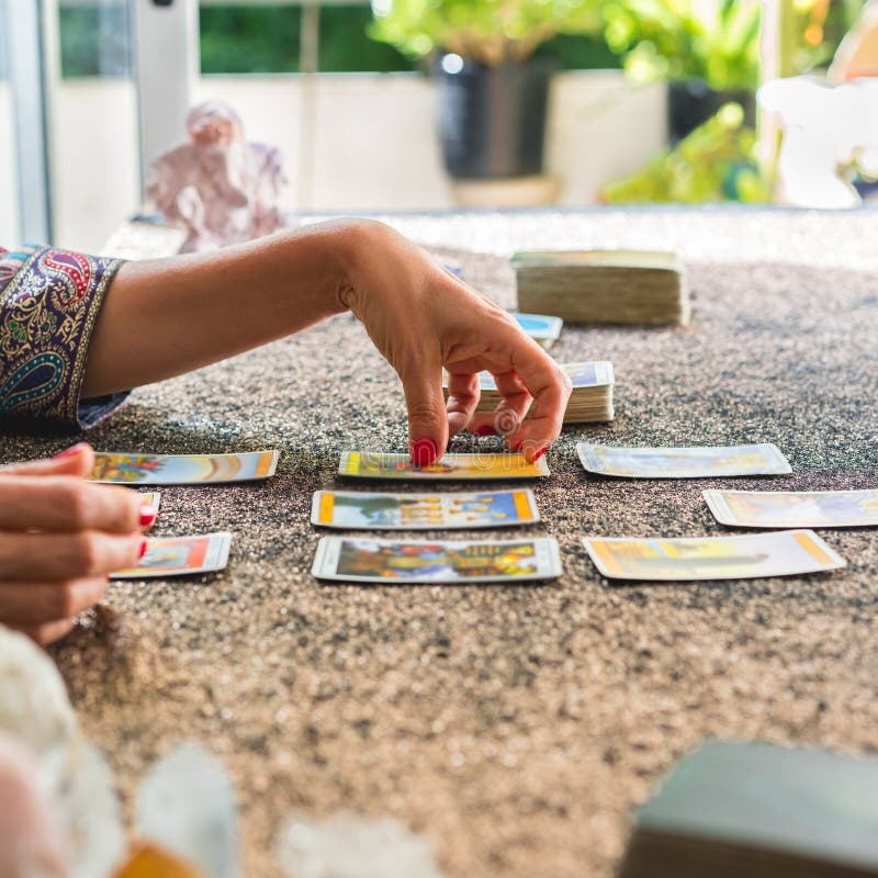 Side View of a Tarot Reader Interpreting the Cards Stock Photo - Image ...