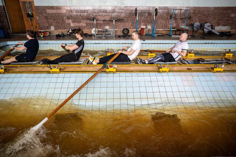 Focused Determined Athletes Refine Synchronized Rowing, Mastering Oar ...