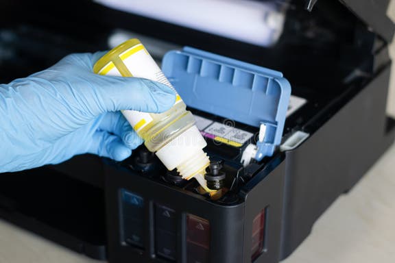 Side View of Technician Filling Printer with Ink Stock Photo - Image of ...