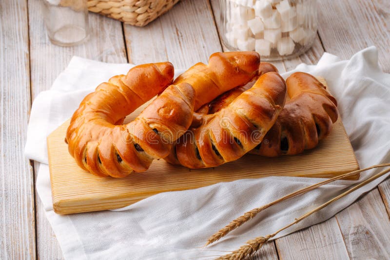 Side View on Three Fresh Baked Bagel Buns Stock Photo - Image of ...