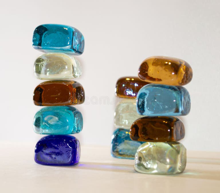 Side View of Three Mini Turrets from Multi-colored Transparent Pebbles ...