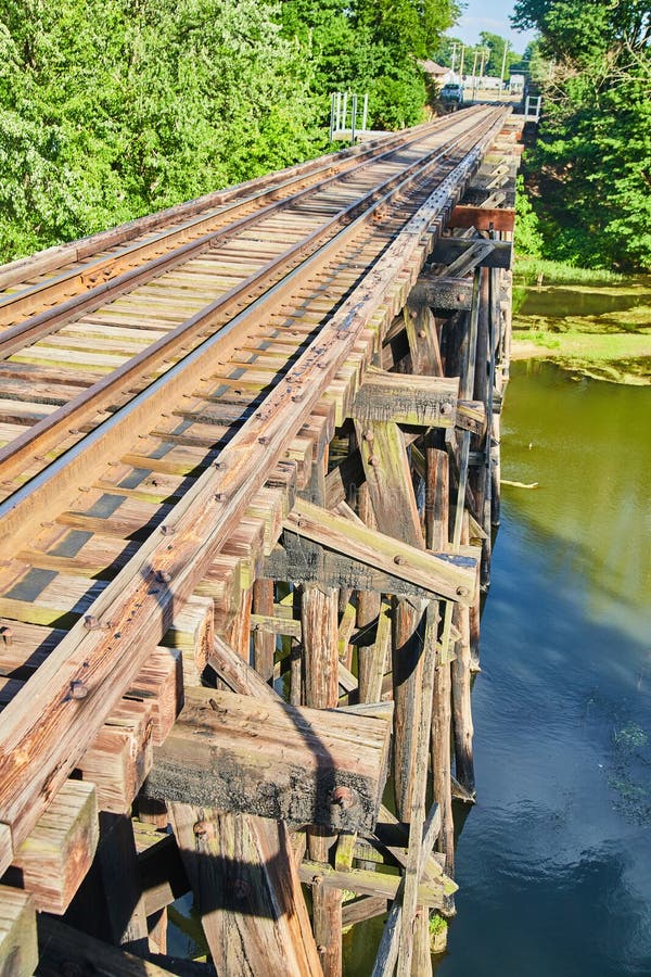Side View on Top of Railroad Bridge of Old Wood Over Water Stock Image ...