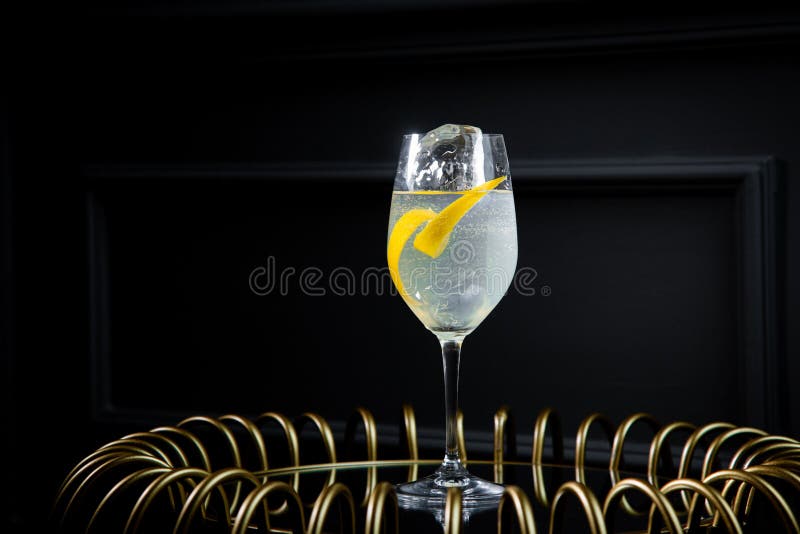 Side View of Transparent Carbonated Cocktail with Lemon and Ice Stock ...