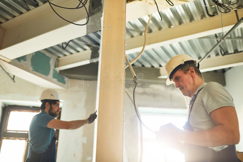 Crew Workers on Site stock photo. Image of remodelling - 172815832