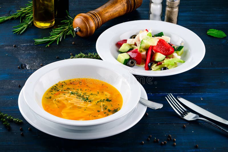 Side View of a Two Course Meal, Served on a Wooden Table Stock Photo ...