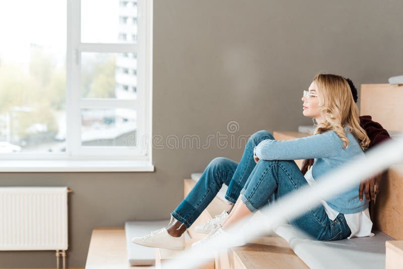 View of Two Multicultural Students Sitting in Lecture Hall Stock Photo ...