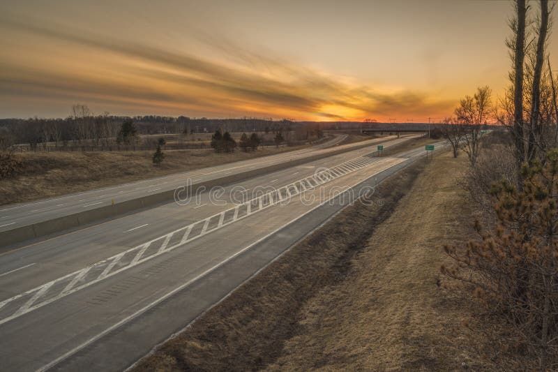 Sunset on a US motorway stock image. Image of angle - 144097919