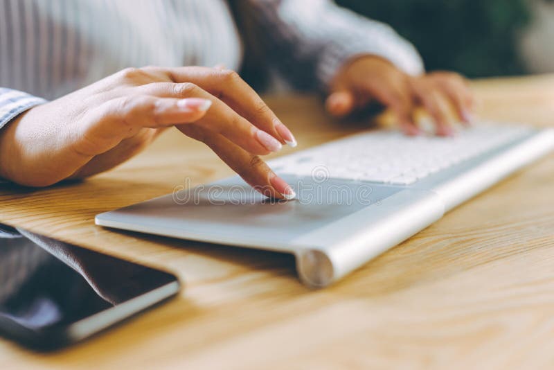 Side-view of Usiness Person Hands Using Touchpad and Keyboard. Stock ...