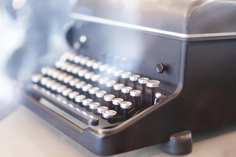 Side View of a Vintage Typewriter an Old Typewriter on a Blurred ...