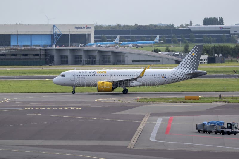 Side View Vueling Airbus Plane at Schiphol the Netherlands 29-8-2024 ...