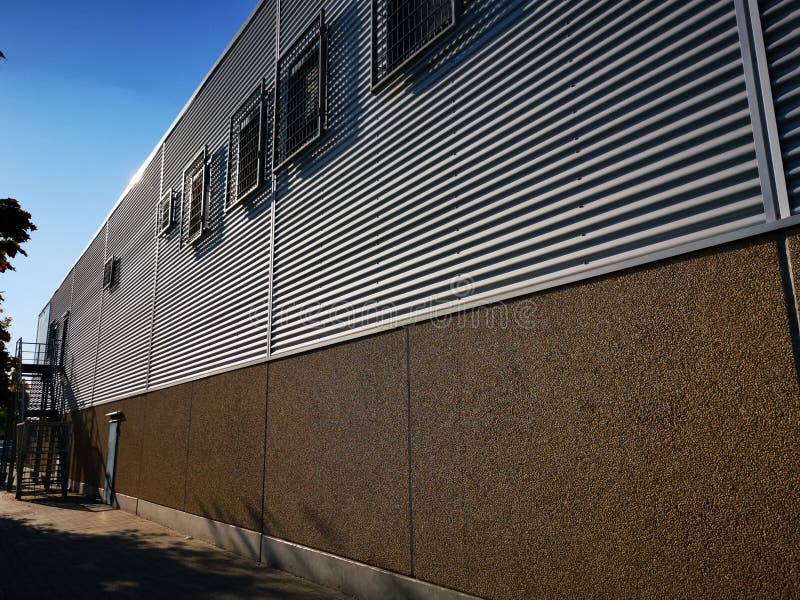 Side View Warehouse with Grilles at Windows Stock Photo - Image of ...