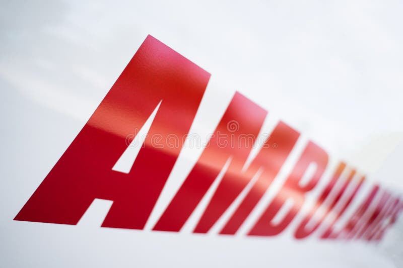 Side View of a White Ambulance with Red Lettering Stock Image - Image ...
