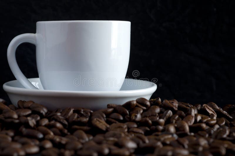 Side View of White Coffee Cup Surrounded with Coffee Beans Stock Image ...