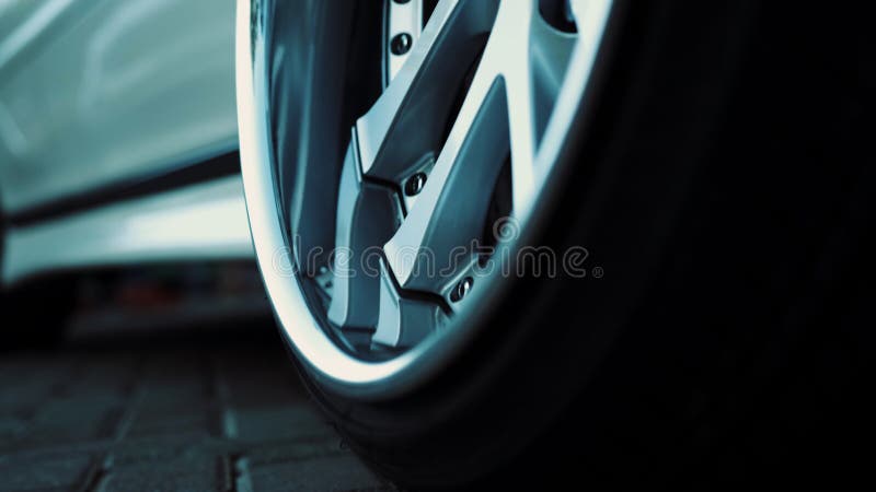 Side View of a White Sports Car and a Stylish Wheel Stock Photo - Image ...
