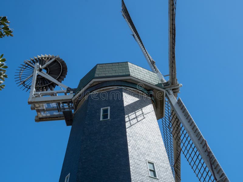 Side View of a Windmill Rotating on a Cloudless Day Stock Photo - Image ...
