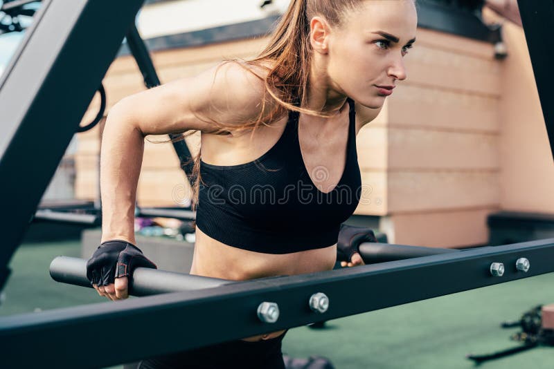 Side View of Woman Athlete Doing Triceps Dip Stock Photo - Image of ...