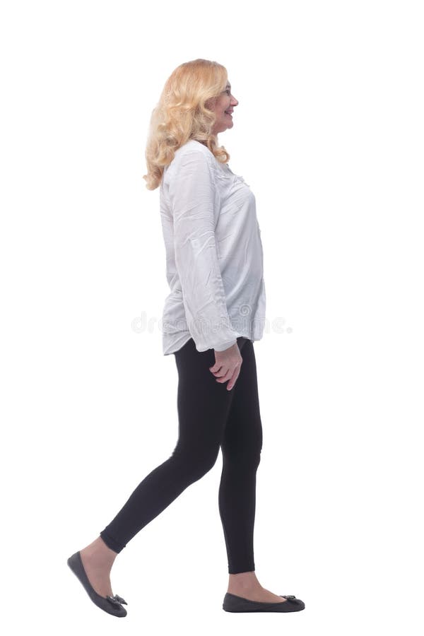 Side View. Woman in Comfortable Clothing Striding Forward Stock Photo ...