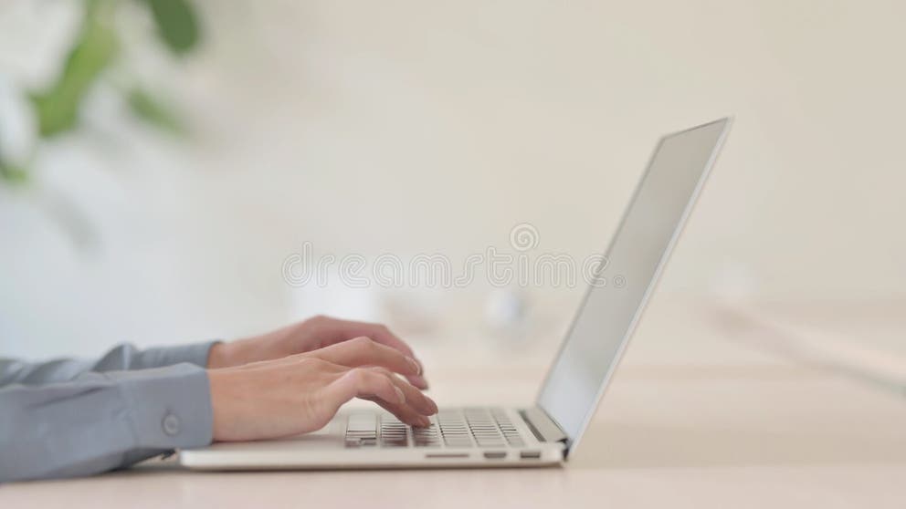 Side View of Woman Typing on Laptop Keyboard Stock Photo - Image of ...