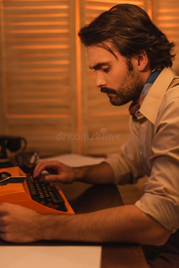 Side View of Writer Using Typewriter Stock Image - Image of profession ...