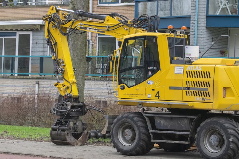 Side View Yellow Excavator at Amsterdam the Netherlands Editorial Stock ...