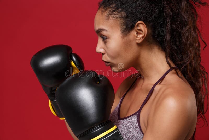 Side View of Young African American Sports Fitness Boxer Woman in ... Side View of Young African American Sports Fitness Boxer Woman in ...